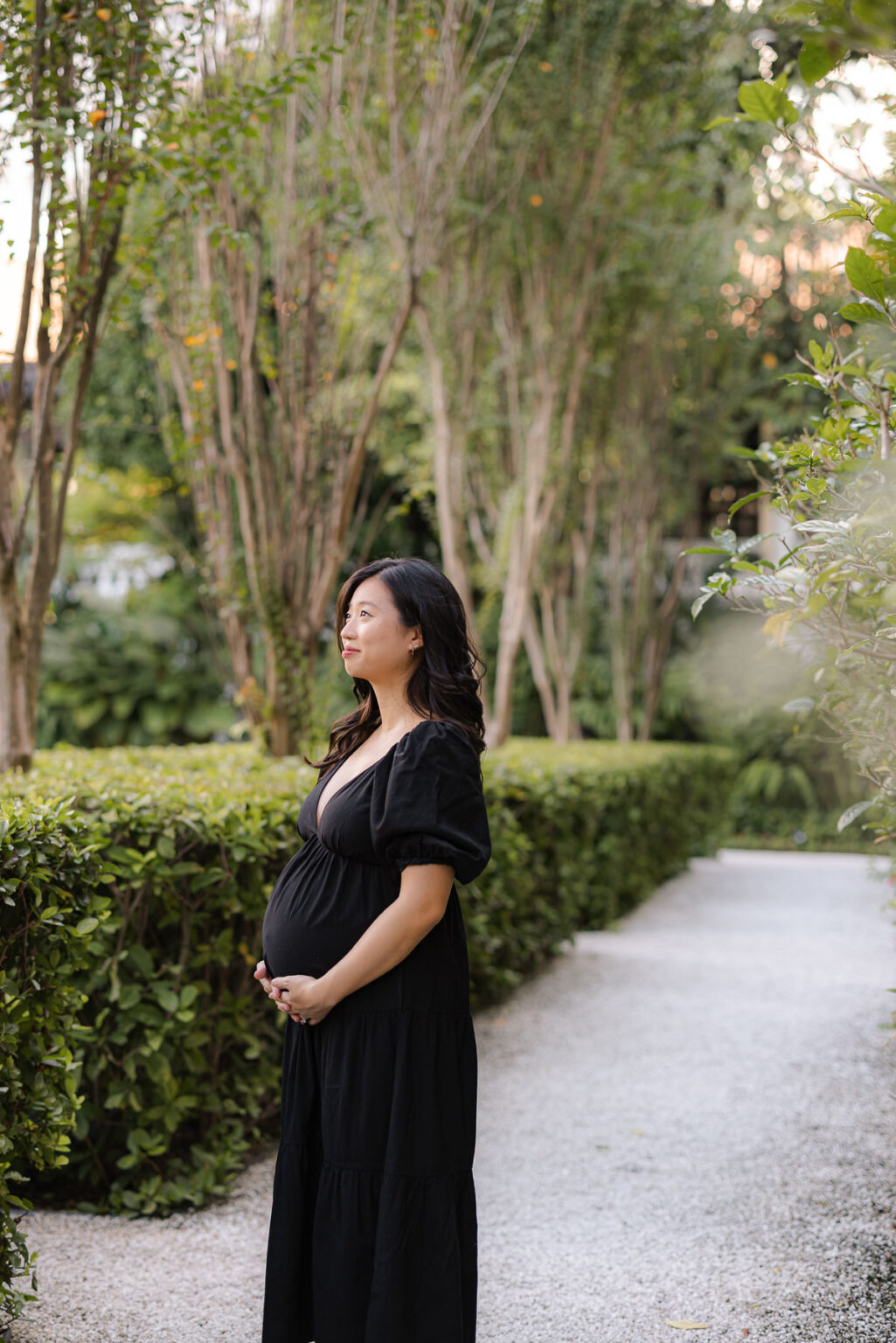 Maternity photoshoot at Raffles Hotel gardens with F & J